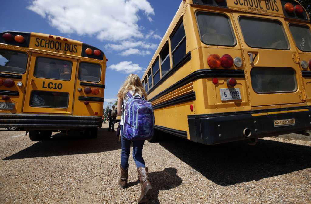 As kids head back to school, police ask drivers to put their phones ...