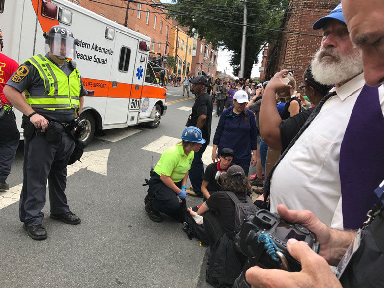 Vehicle plows into protesters in Charlottesville, 1 death reported ...