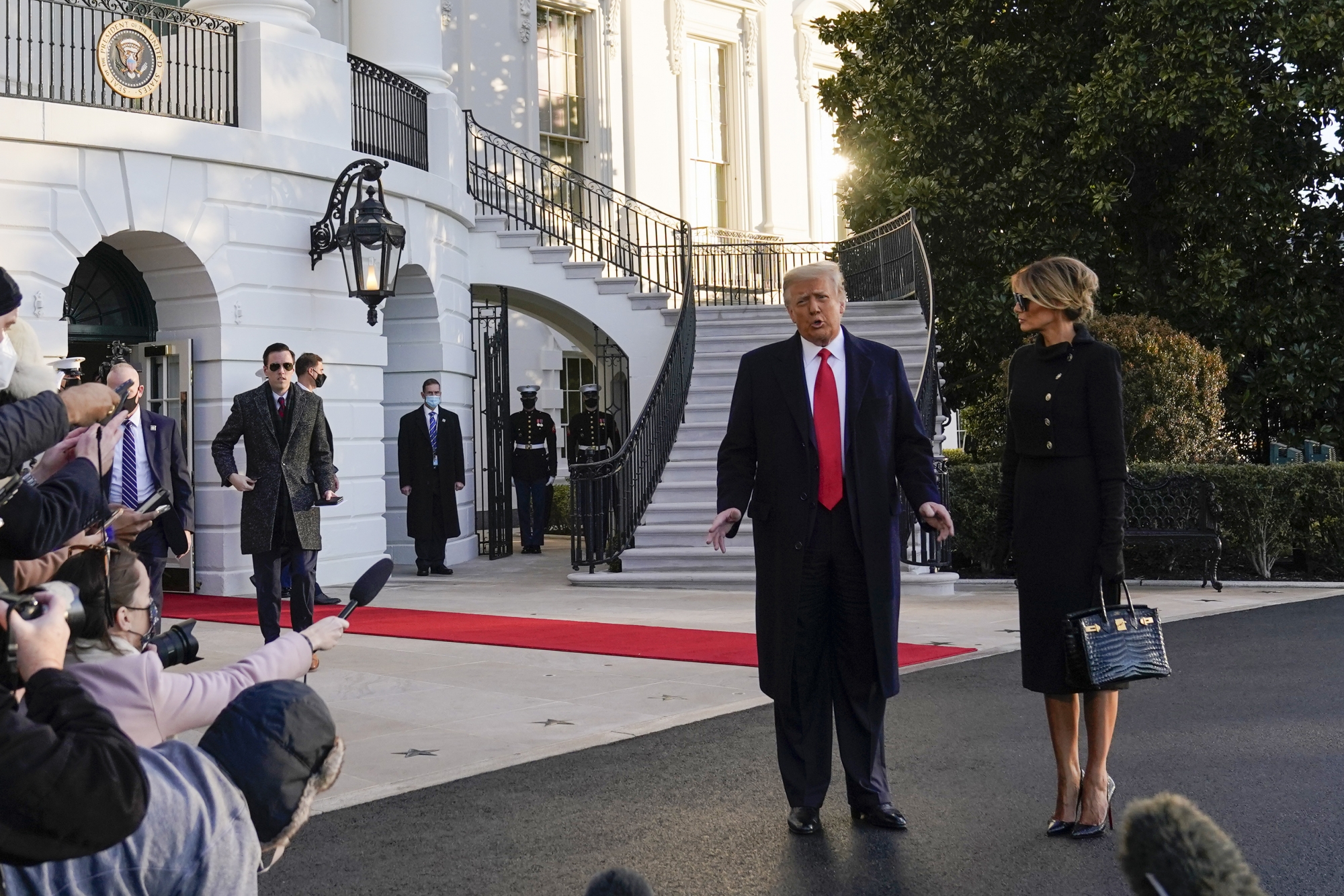 Trump bids farewell to Washington, hints of comeback - WTOP News