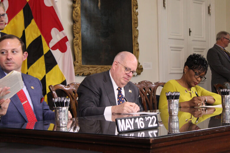 At bill signing, top leaders celebrate capital budget, new health care ...