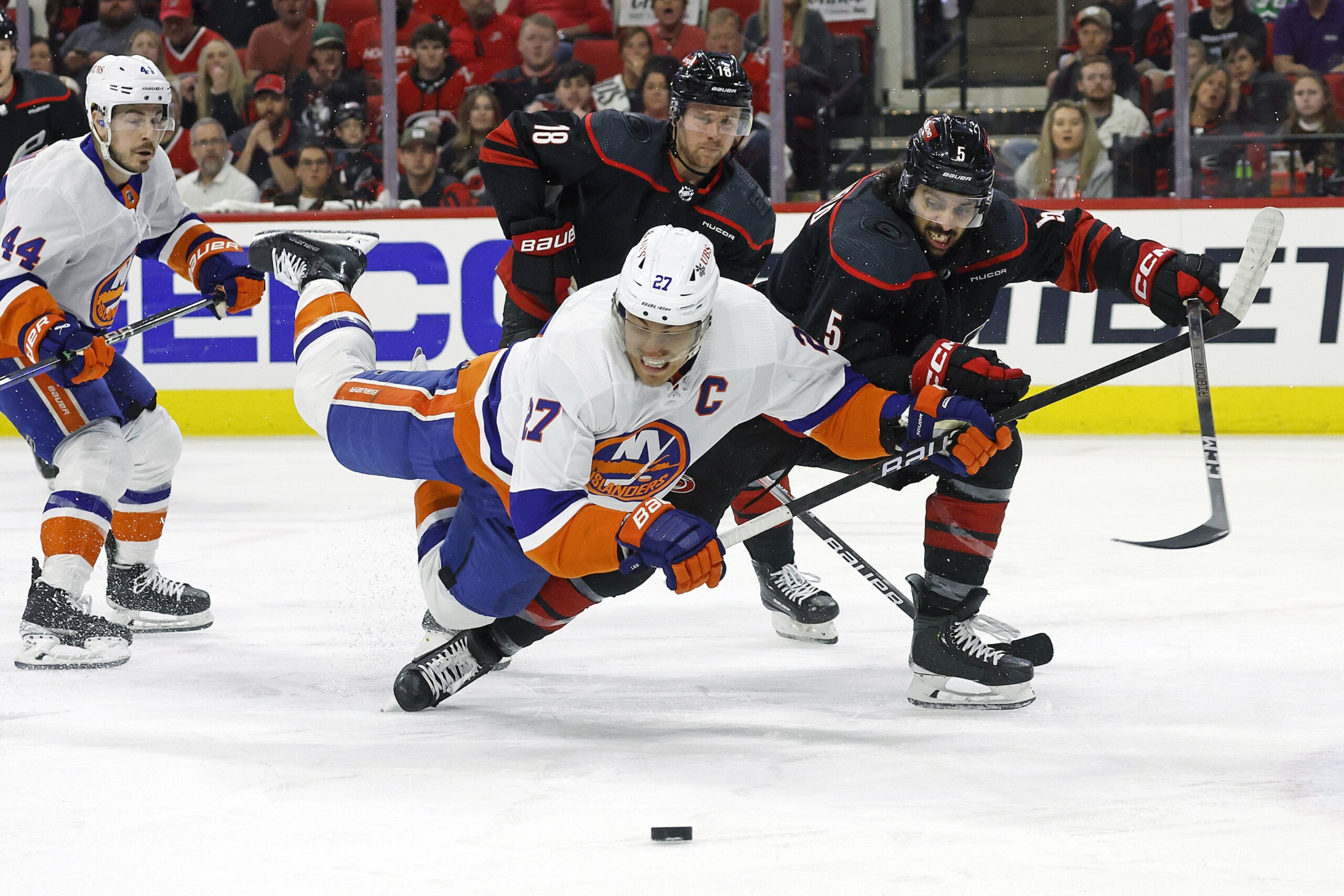 Drury, Noesen help Hurricanes beat Islanders 6-3 to clinch NHL playoff ...