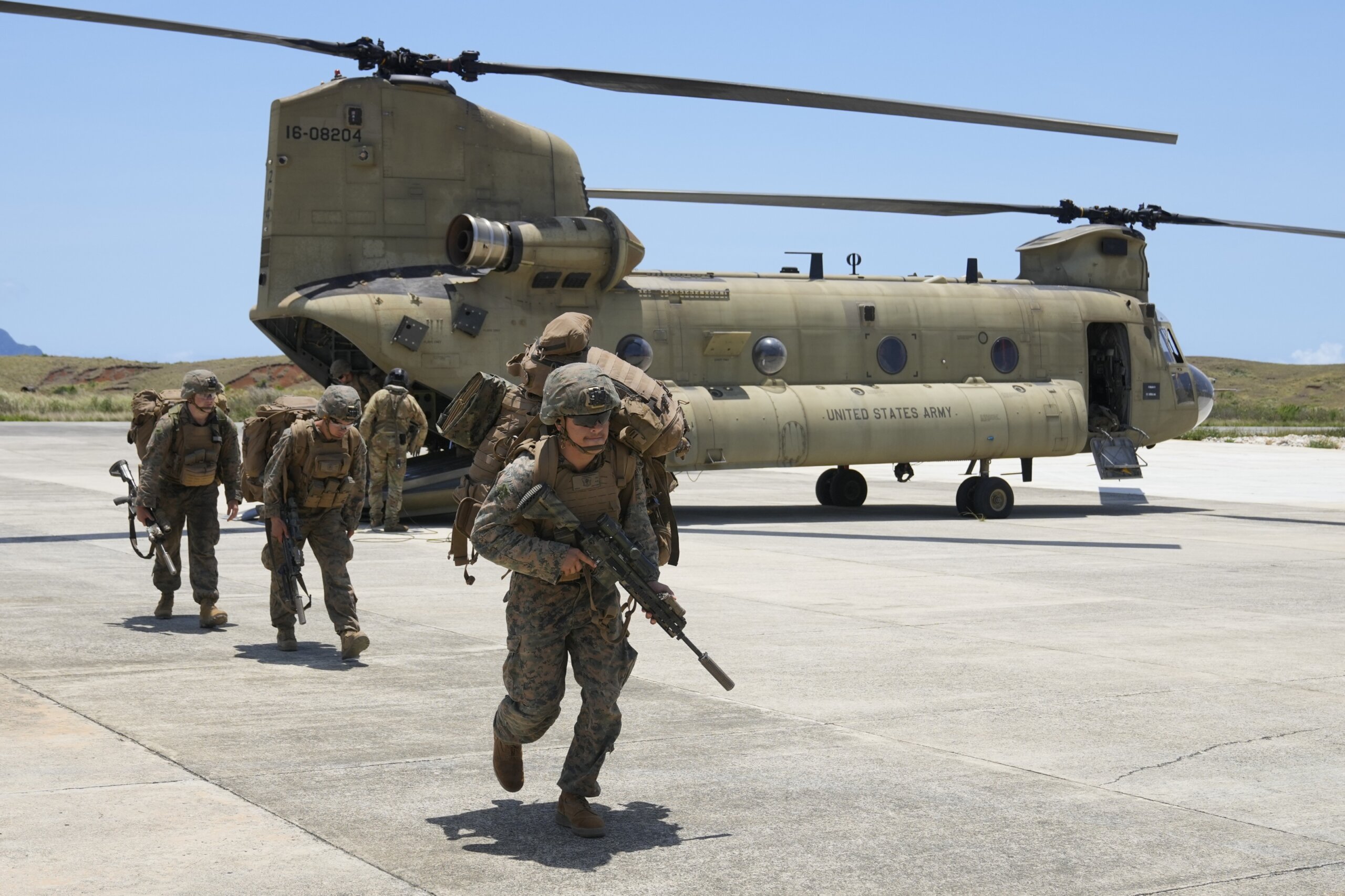 US and Philippine forces stage combat drills near strategic channel off ...