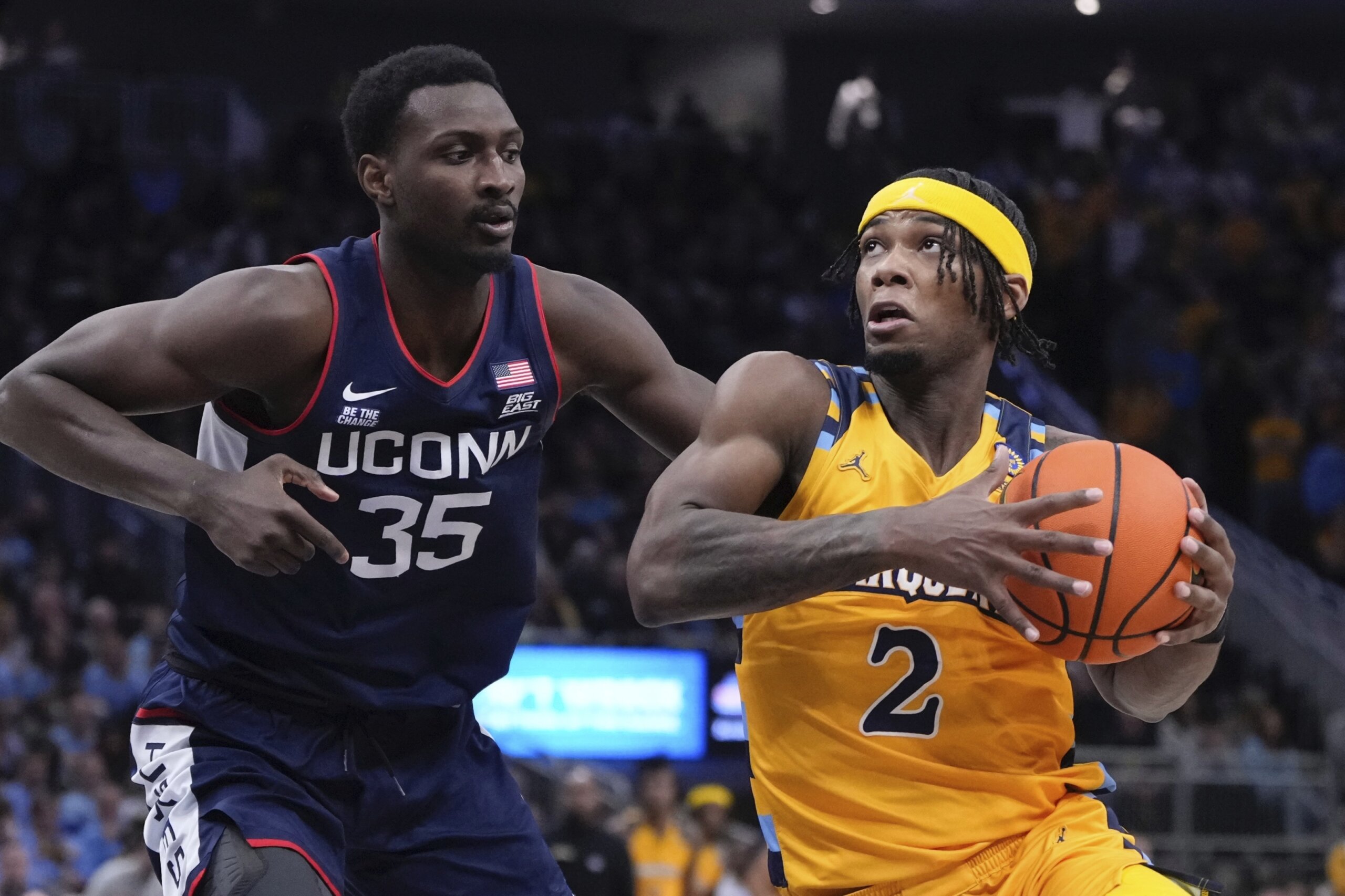 Solo Ball’s big night helps No. 25 UConn win 77-69 at No. 9 Marquette ...