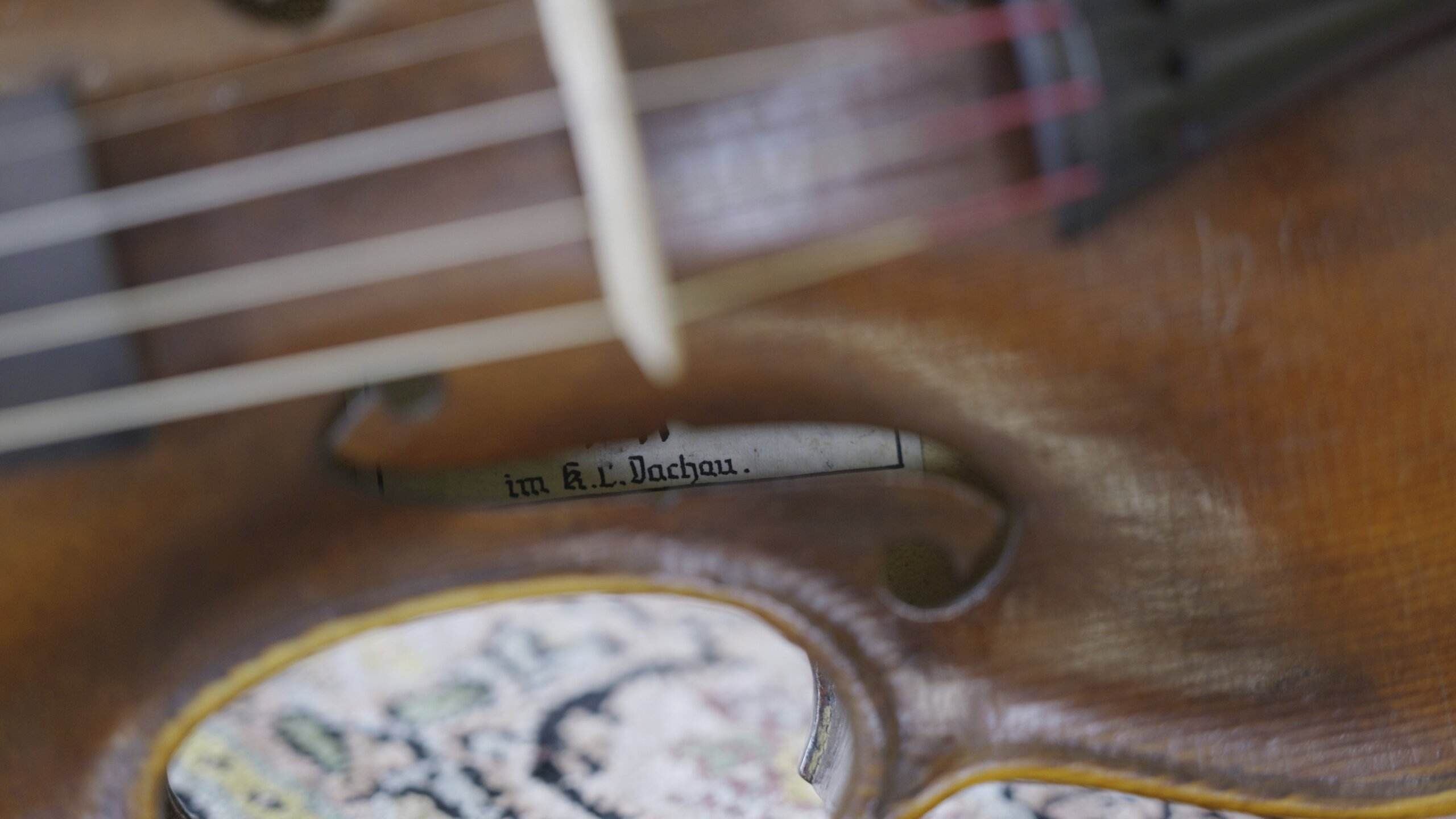 A secret note hidden in Dachau-built ‘Violin of Hope’ tells a tale of ...