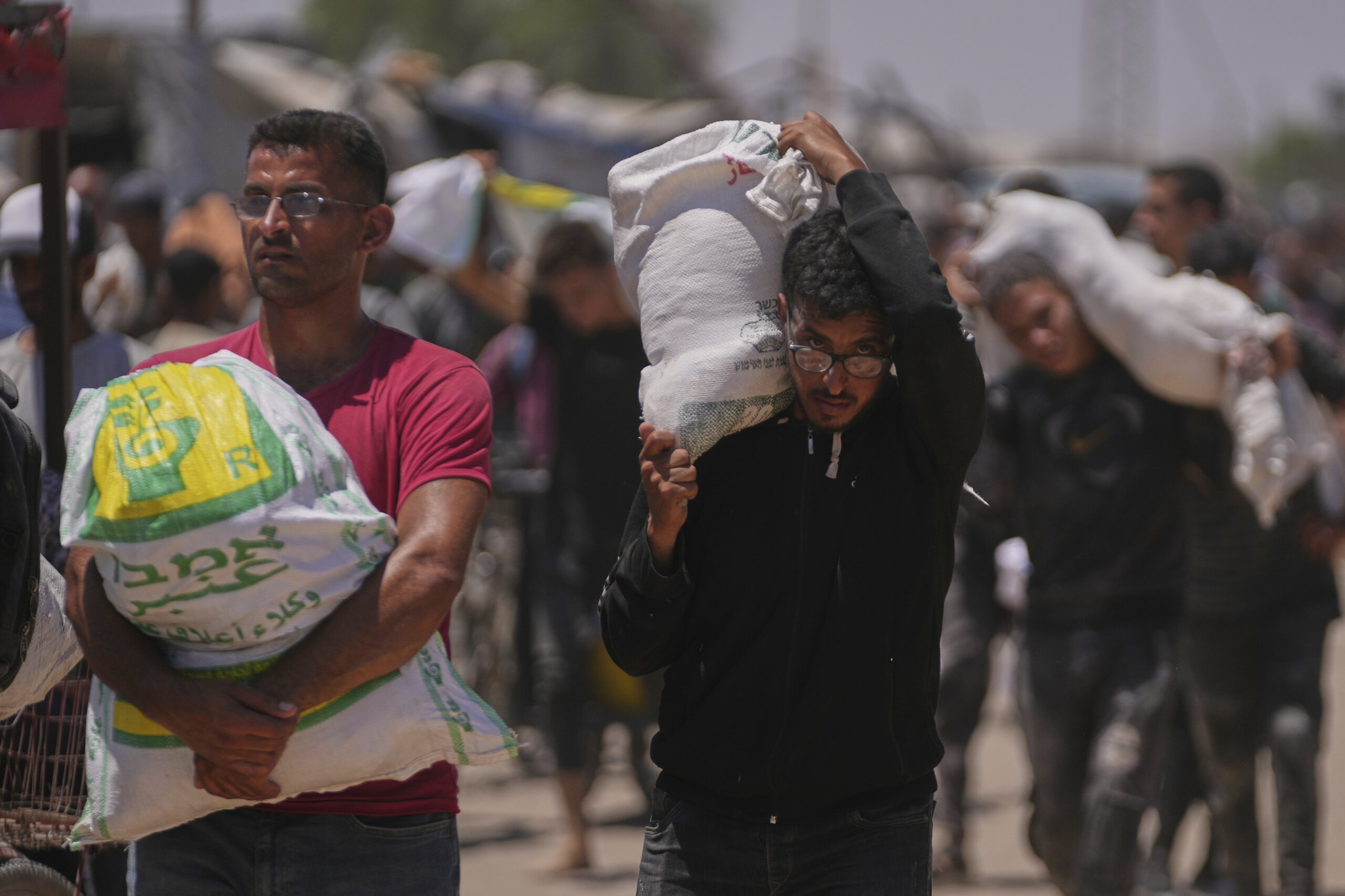 An Israeli strike kills 18 Palestinians in central Gaza as turmoil ...