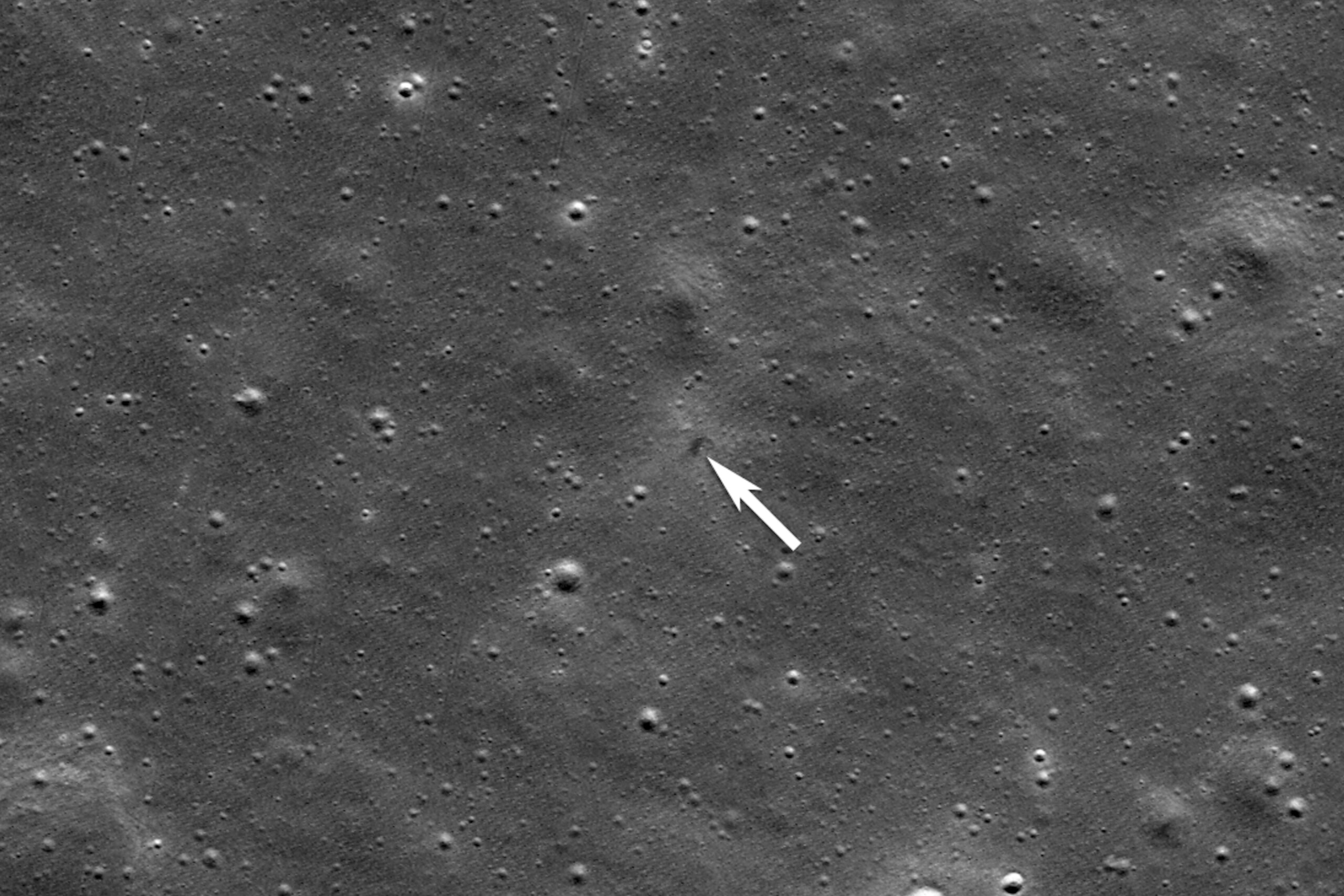 NASA spacecraft around the moon photographs the crash site of a ...