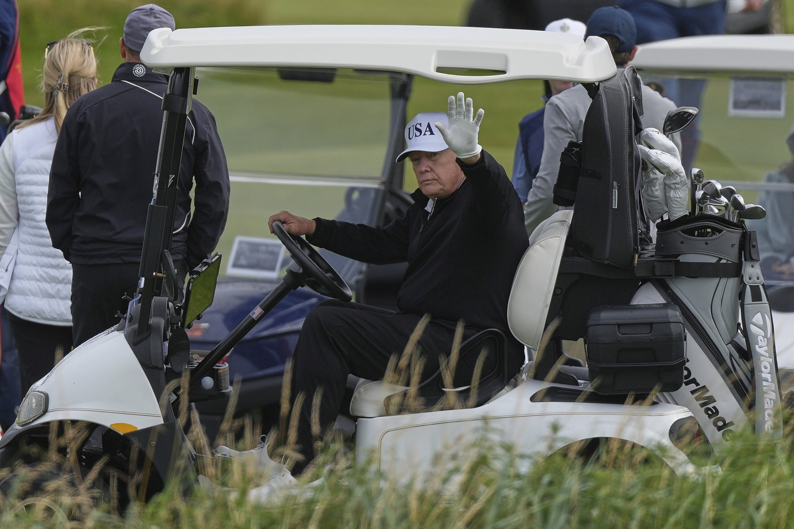 Trump plays golf in Scotland while protesters take to the streets and ...