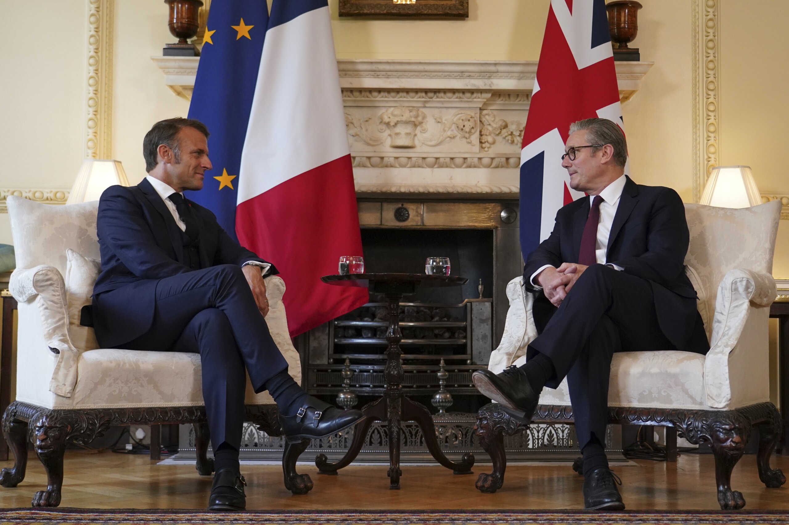 UK and France agree to send some migrants arriving in Britain by boat ...