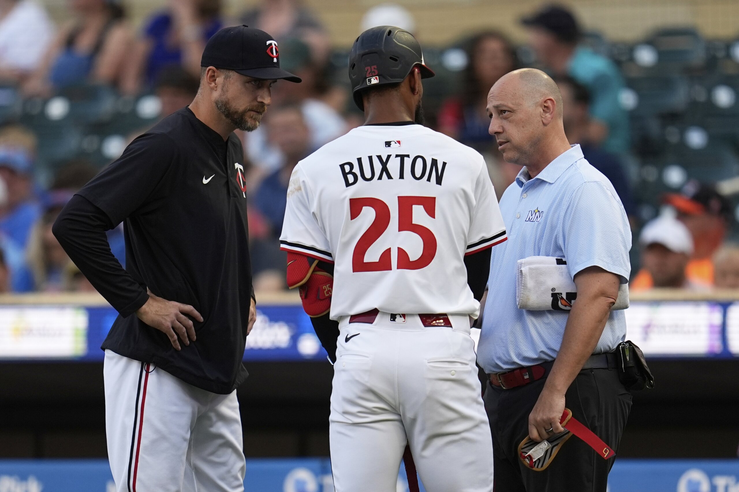 Twins keep sore Buxton out of starting lineup with bruised hand, but ...