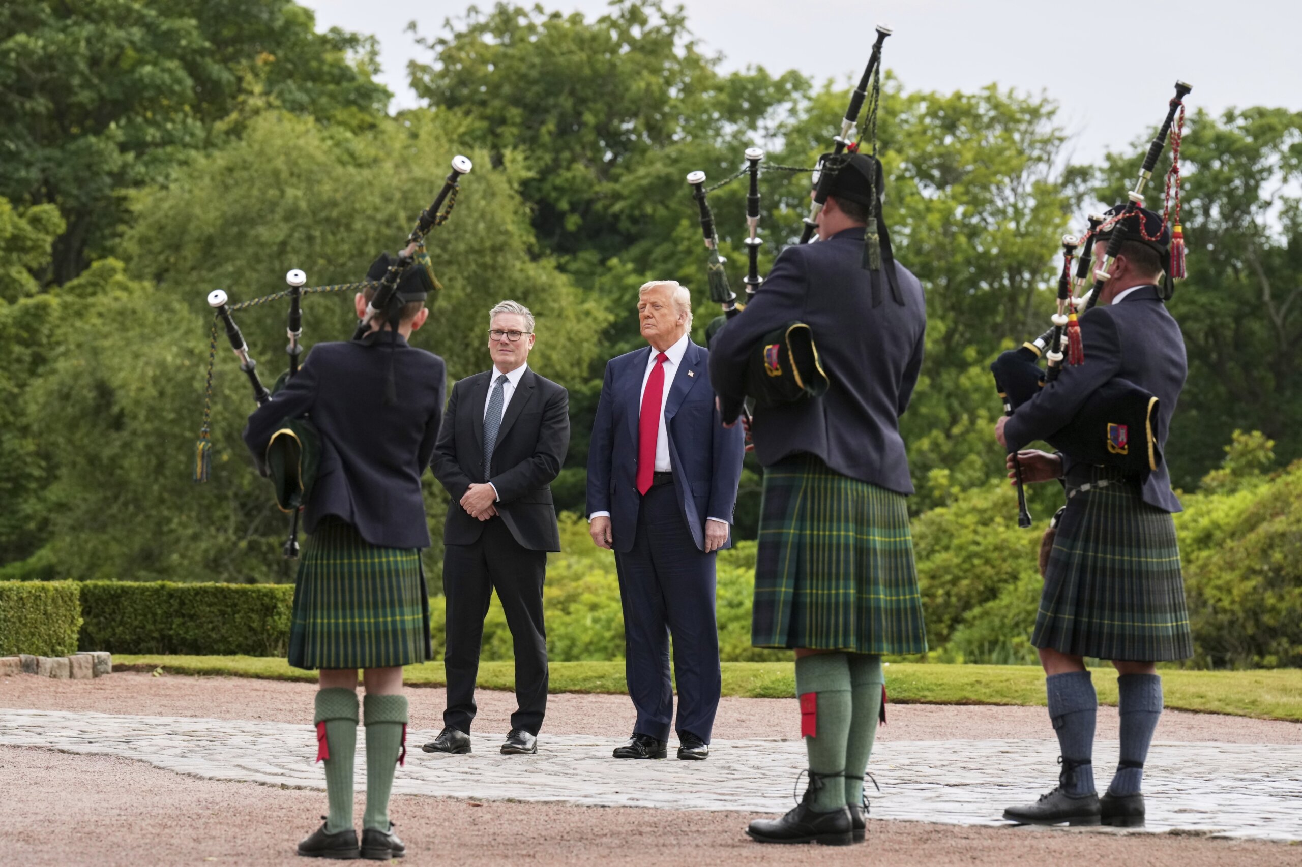 Trump caps his Scottish visit by opening a new golf course and ...