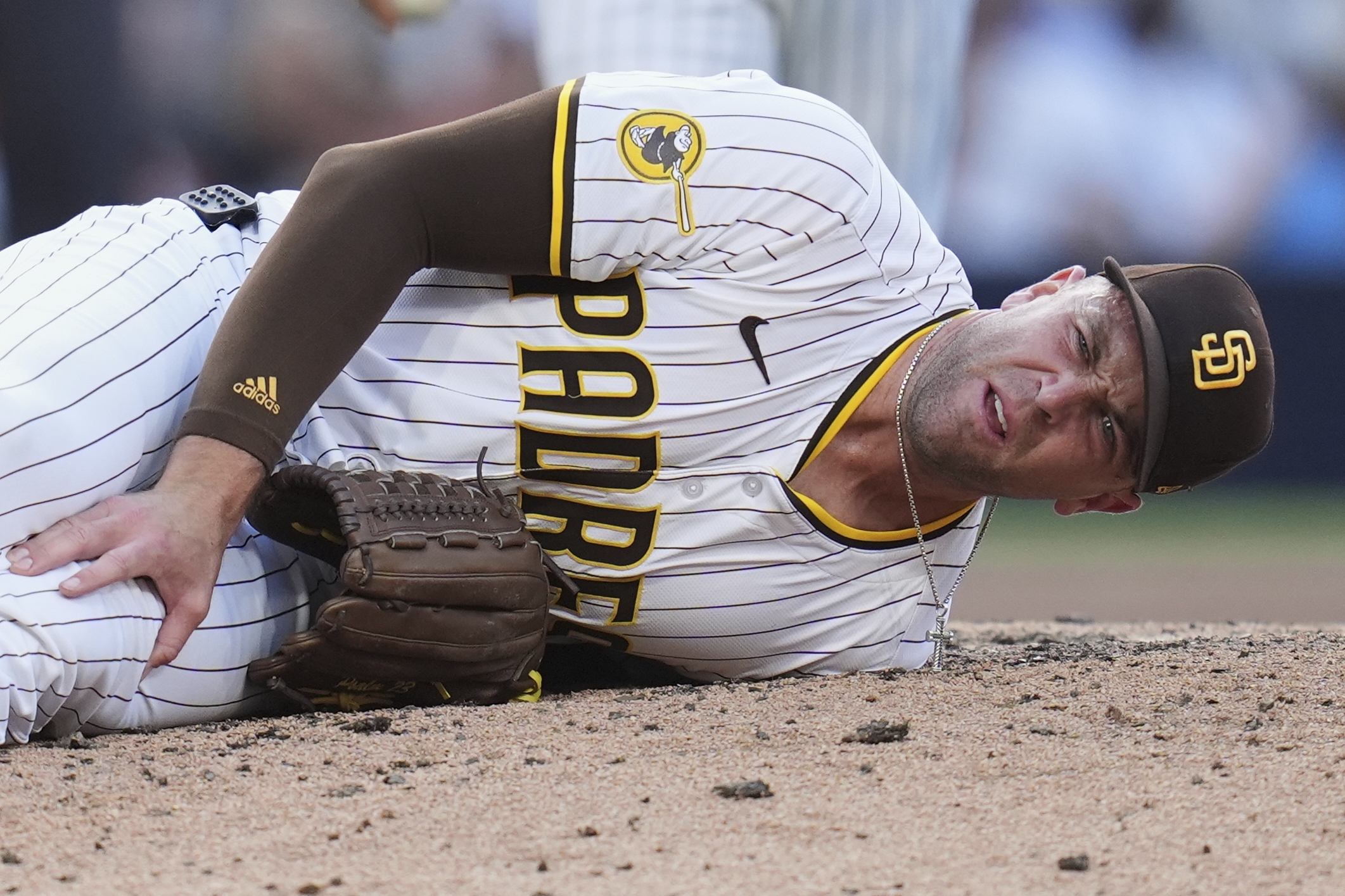 Padres reliever Jason Adam carted off field with ruptured quadriceps ...