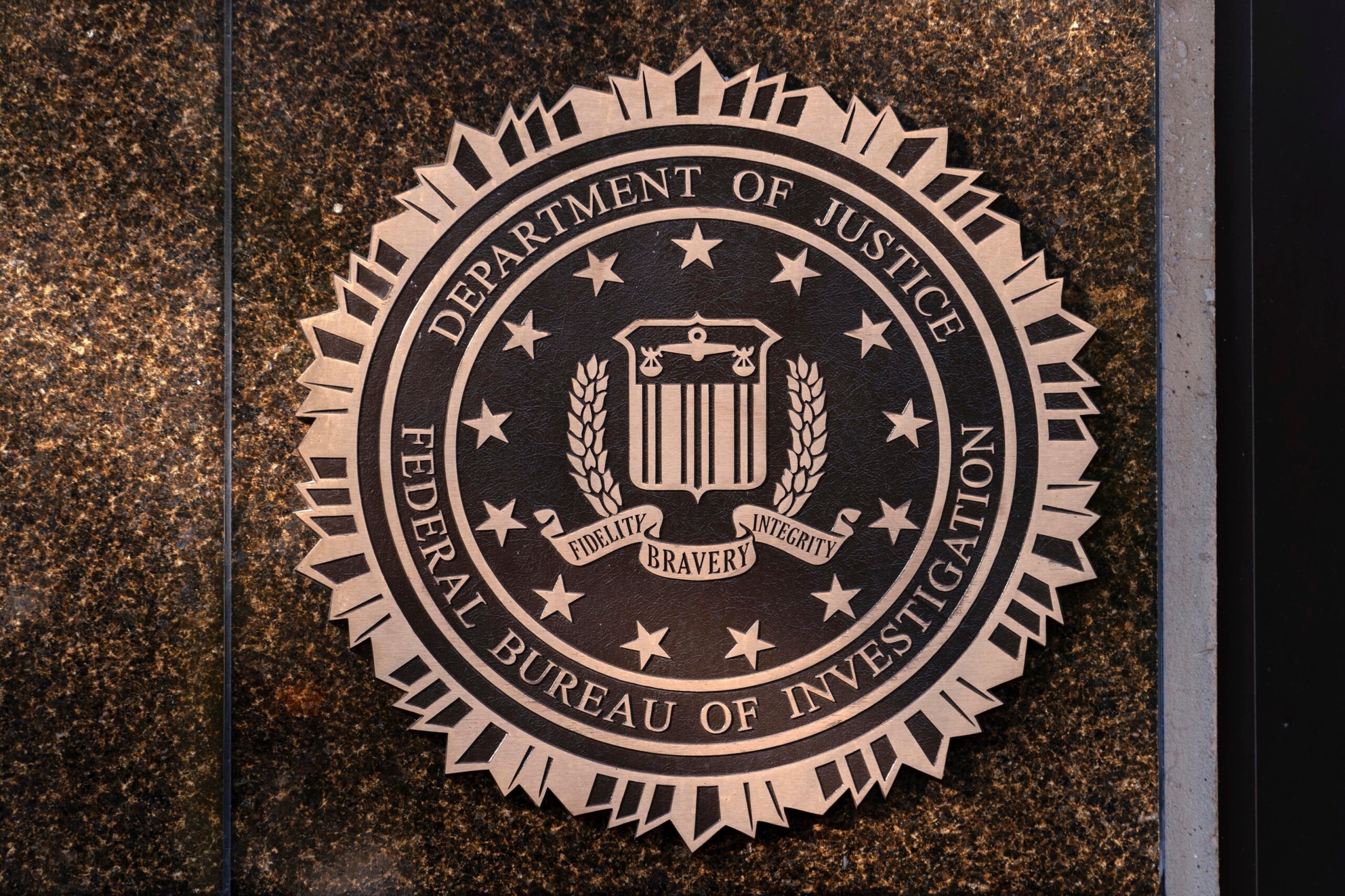 Veteran FBI employee sues bureau after being fired over displaying a ...