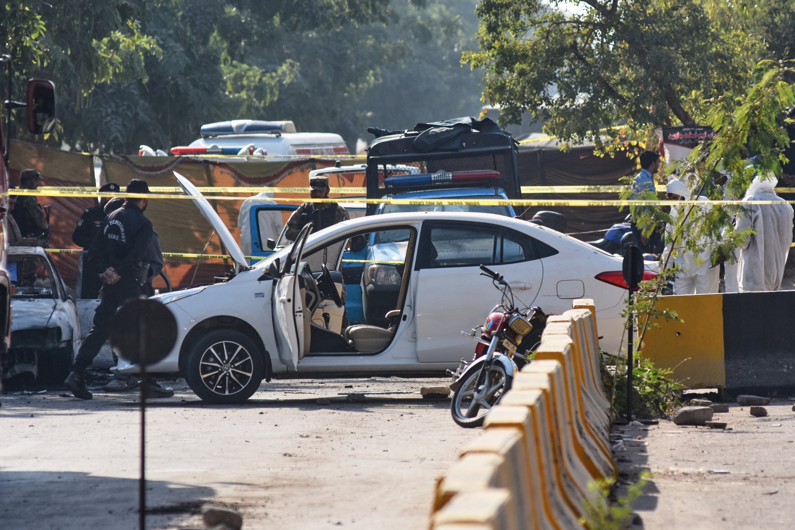 Pakistan investigates the suicide bombing that killed 12 outside an ...