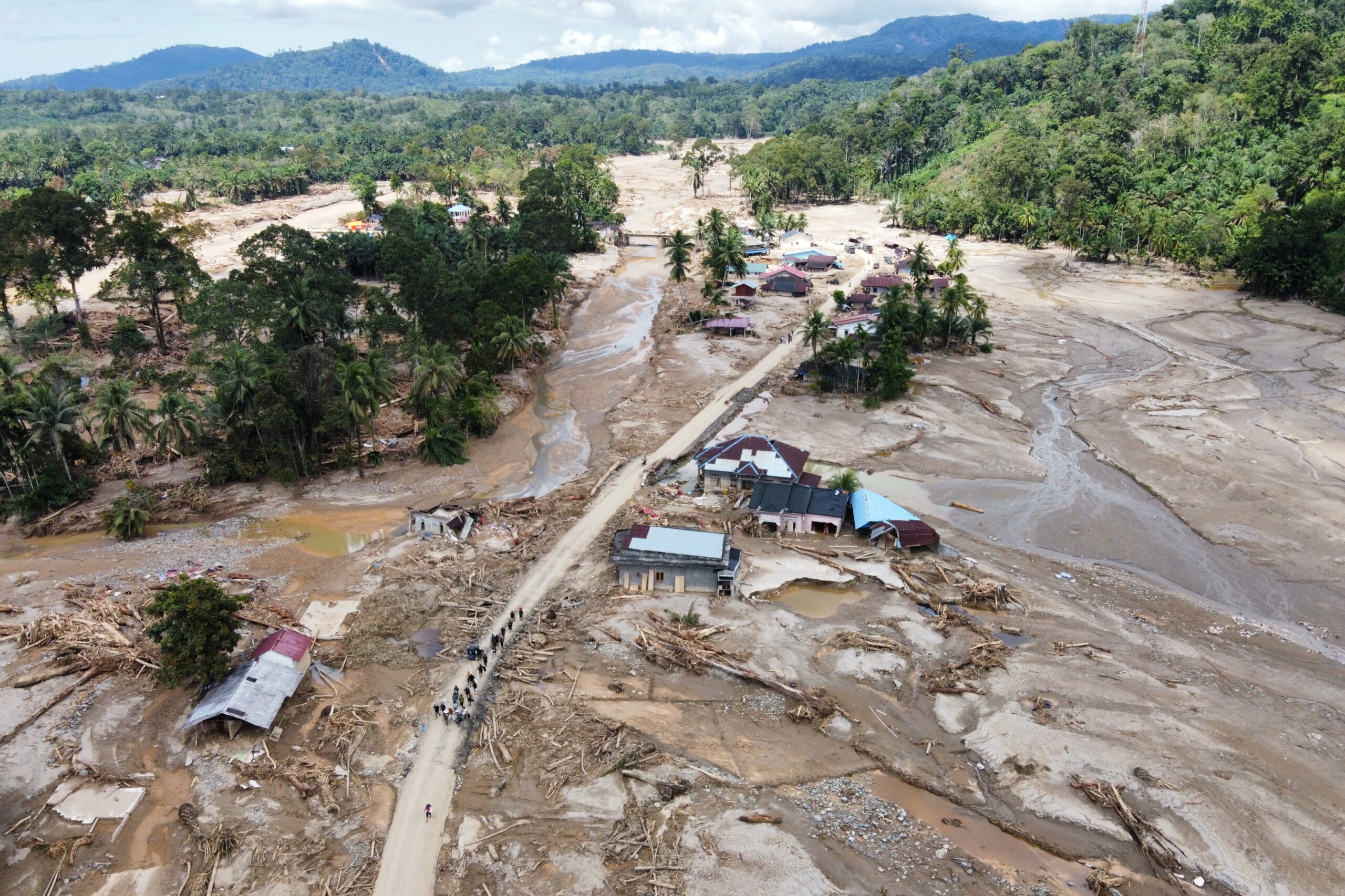 Over 800 people are still missing after flooding in Indonesia, Sri ...
