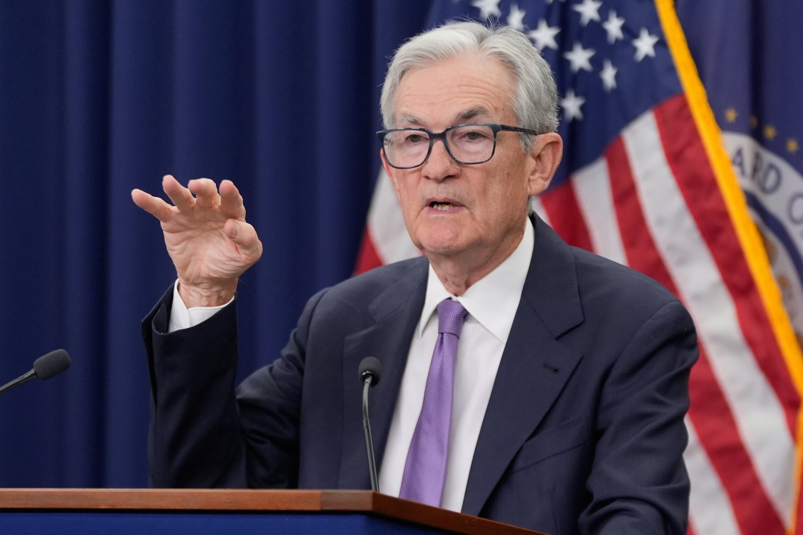 Federal Reserve cuts key rate, sees healthier economy next year - WTOP News