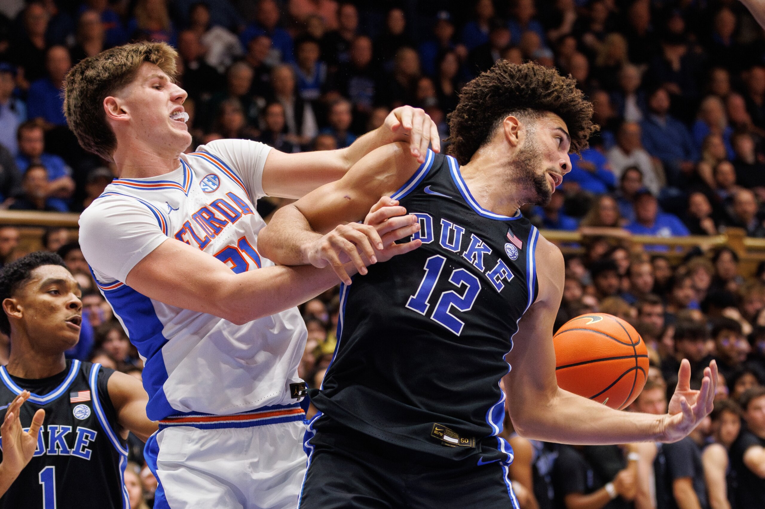 Evans’ late 3 helps No. 4 Duke top No. 15 Florida 67-66 in ACC/SEC ...