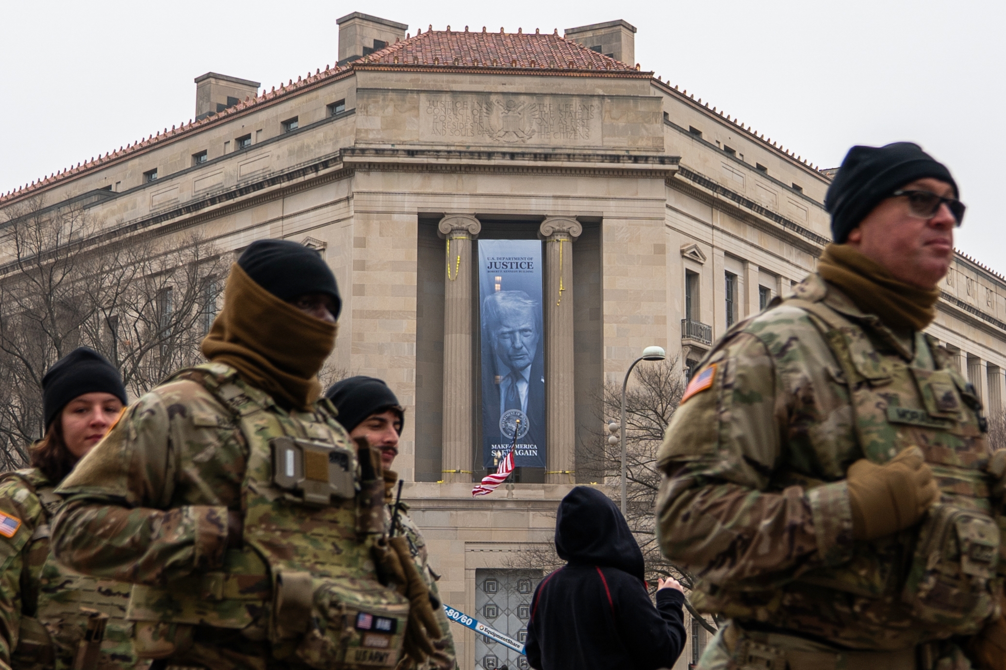 Large banner featuring Trump’s face is displayed on Justice Department ...