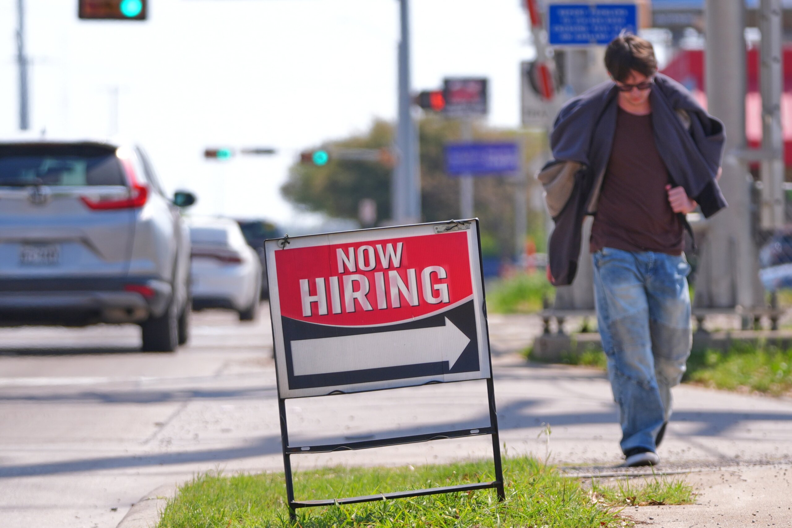 US filings for jobless aid tick up last week to 210,000 but remain at ...