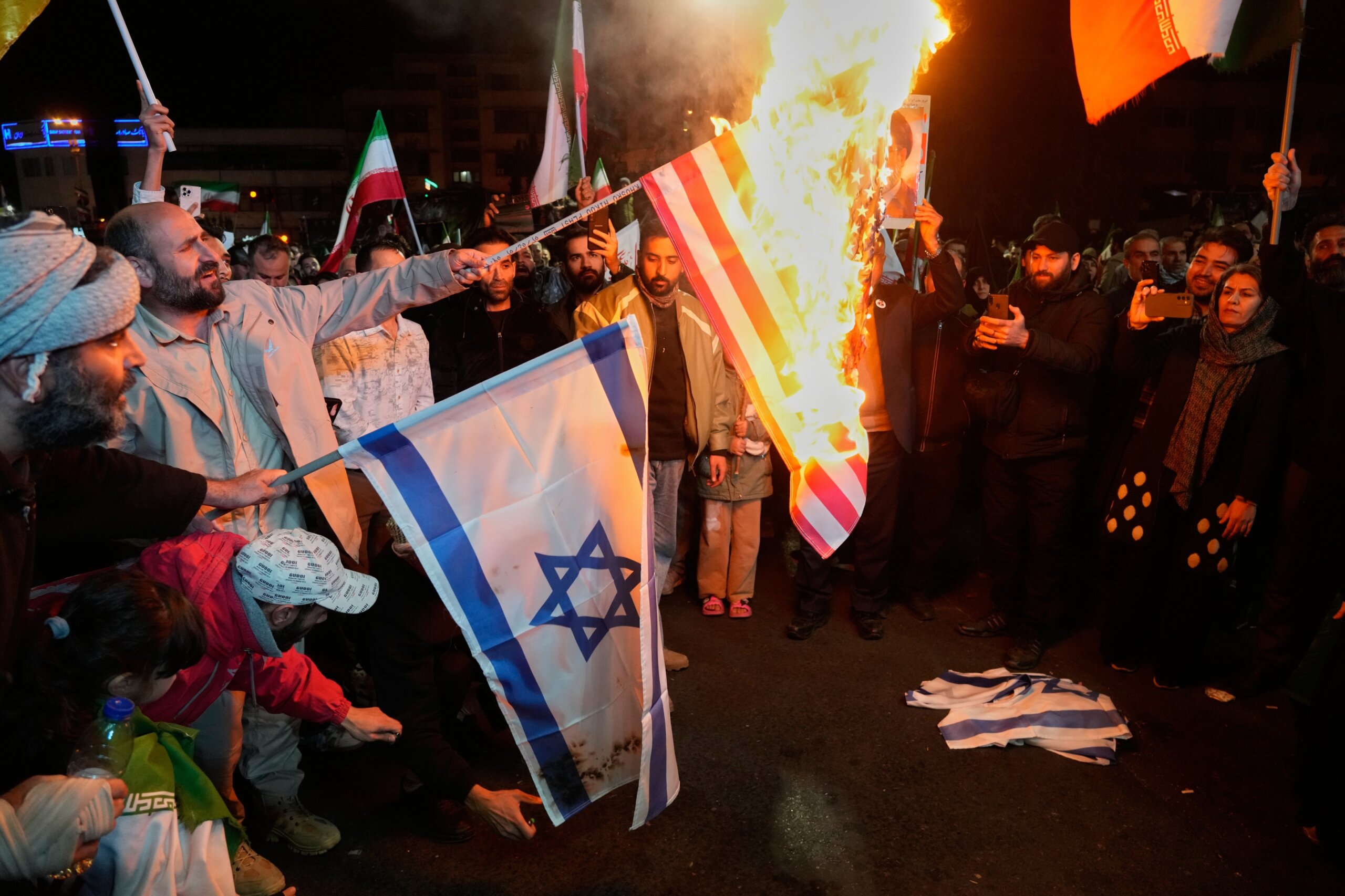 The Latest: Iran closes the Strait of Hormuz in response to Israeli ...