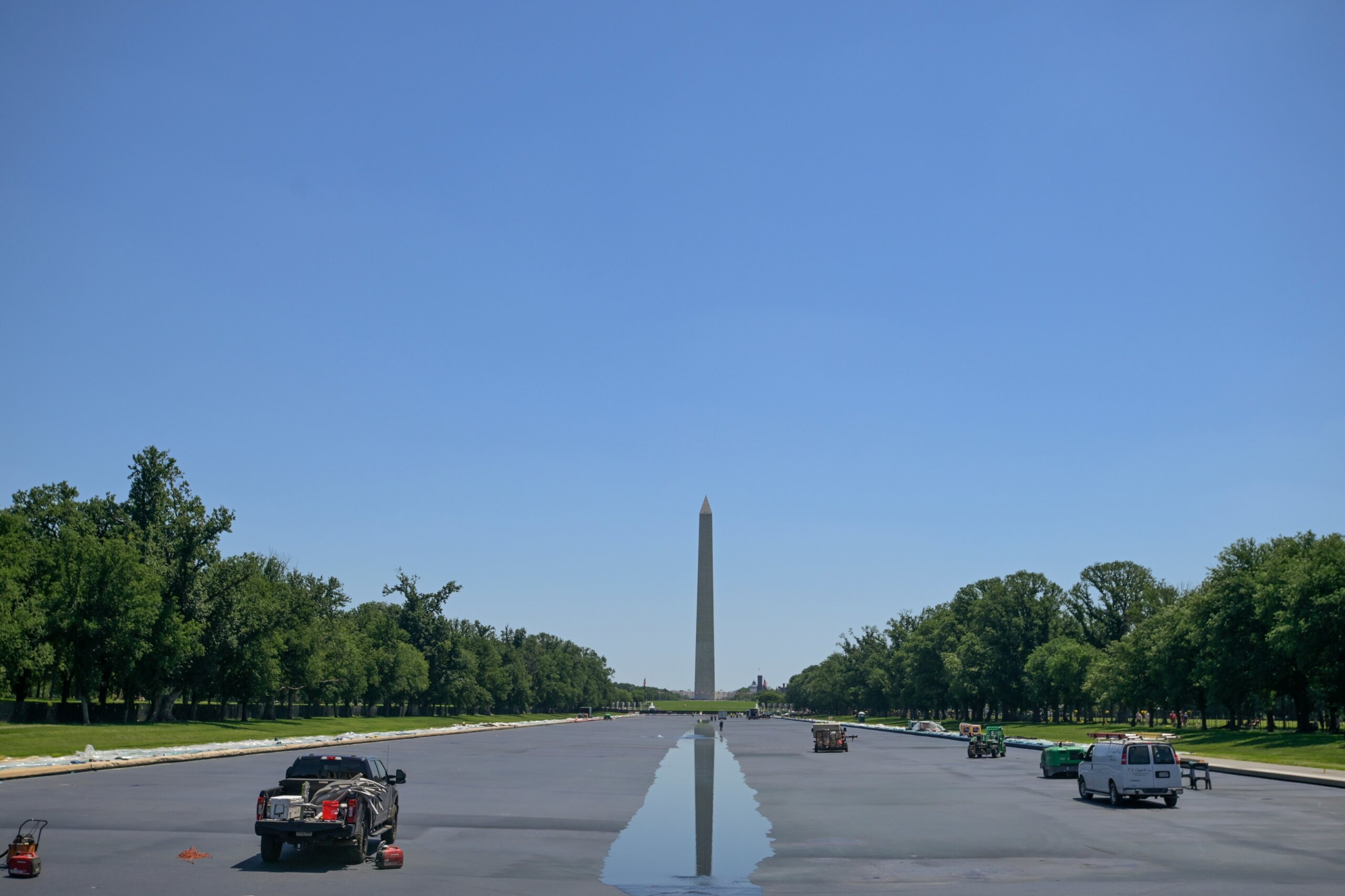 Water begins flowing into Reflecting Pool with blue paint job complete ...
